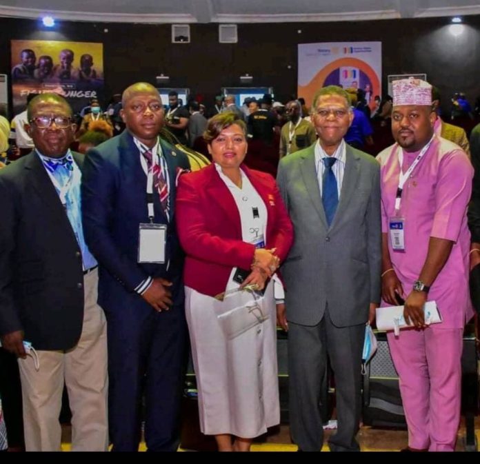 Oyebade Presents Certificates to Rotarian Abiodun Oshinibosi, Ojobo Edward,
